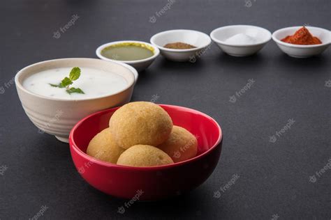 Premium Photo Dahi Vada Or Dahi Bhalla Also Known As Curd Vadai In