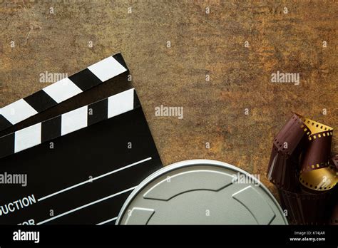 Clapper Board With Film Reel Stock Photo Alamy