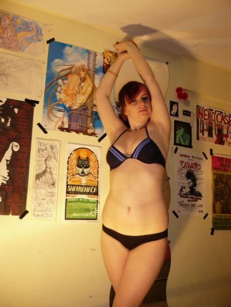 Young Emo Girl Reveals Her Firm Tits While Taking Self Shots