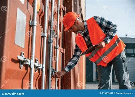 Male Worker Is Opening A Container Stock Photo Image Of Lighting Manager