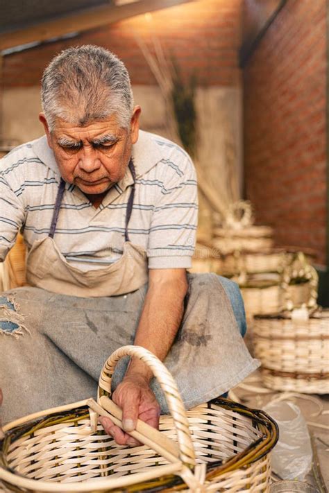 Latin American Old Man Placing Handle On His Wicker Basket Argentinian