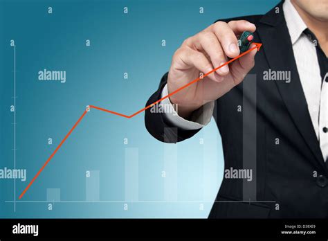 Male Hand Drawing A Graph Stock Photo Alamy