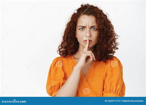 Angry Redhead Woman Shushing Hush At You With Frowning Displeased Face