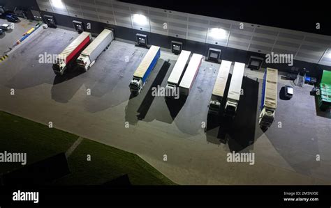 Aerial View Of Goods Warehouse Night Logistics Delivery Center In