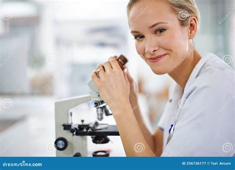 Beauty And Brains A Beautiful Woman In A Laboratory Working With A