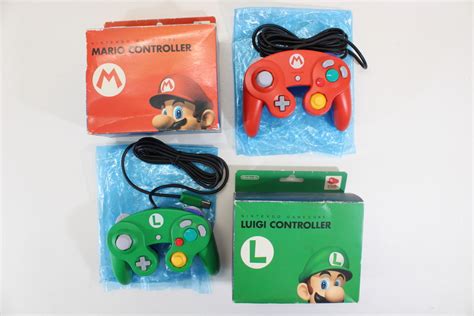 Boxed Lot Of 2 Official Club Nintendo Gamecube Controllers Mario Red X Blue And Luigi Green X Blue