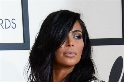 Kim Kardashian Dons Metallic Fringe Netted Top For Paris Fashion Week UPI Com
