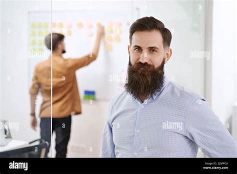 Happy Smiling Bearded Senior Developer Or Manager In Modern It Office