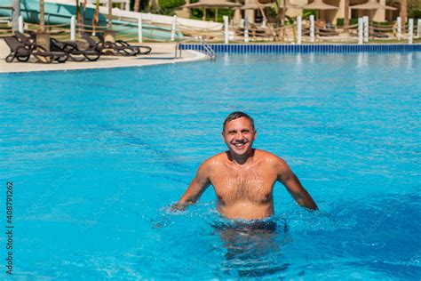 Handsome Guy Half Naked Cheerful Man Smiling Laughing In Blue Water