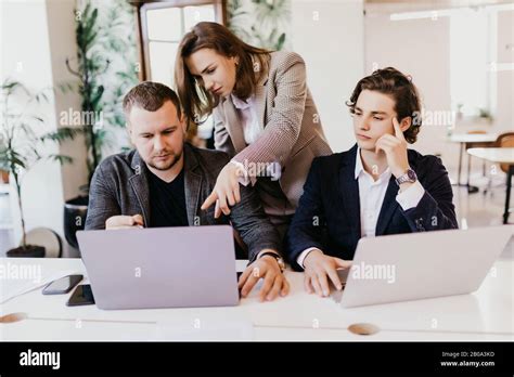 Businessteam Working Together On Project Stock Photo Alamy