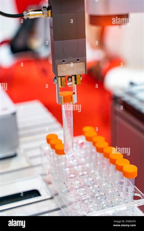 Robot Arm With Test Tube For Biological Experiments In Laboratory Stock