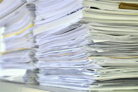 Stack Of A Paper With Colorful Tagging For Easy Reference Blank Space For Writing Text At A