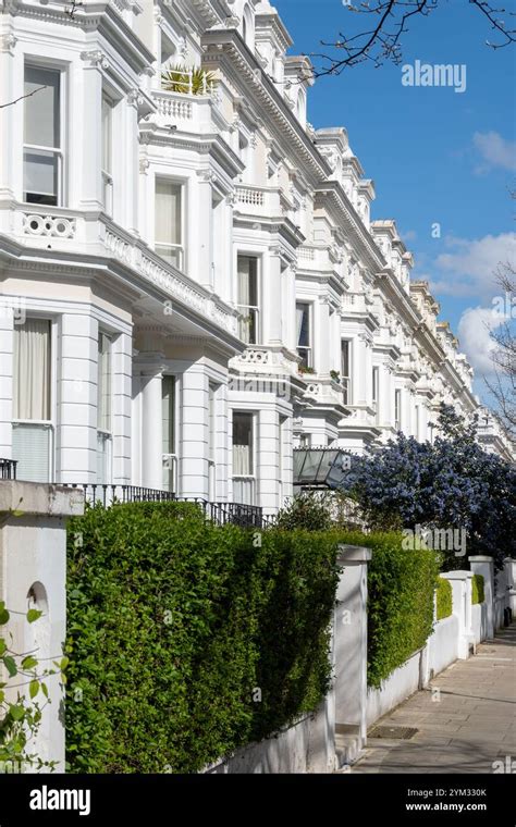 Notting Hill Walking On Streets With White Houses And Flowering