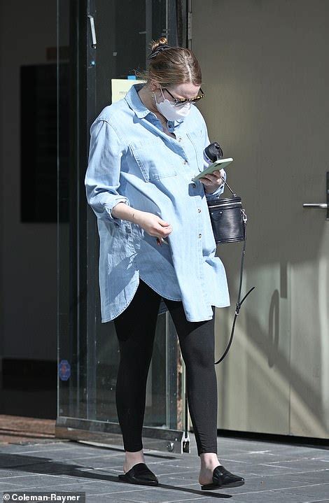 A Very Pregnant Emma Stone Flaunts Her Belly While Running Errands In