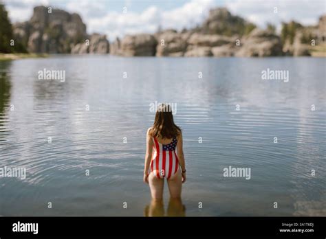 Woman In Patriotic Swimsuit Standing In Sylvan Lake Sd Stock Photo Alamy