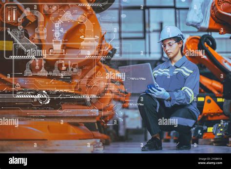 Engineer Staff Using Laptop Computer Technology Software Program Robot In Robotic Industry