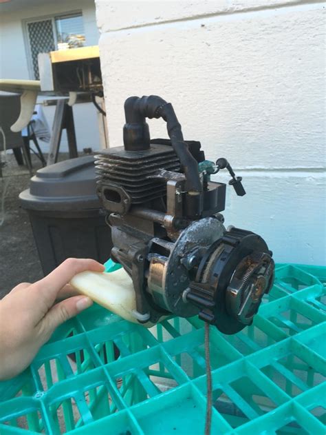 Is this 196cc clone(?) engine salvageable? Exhaust valve spring broke and dropped the valve into ...