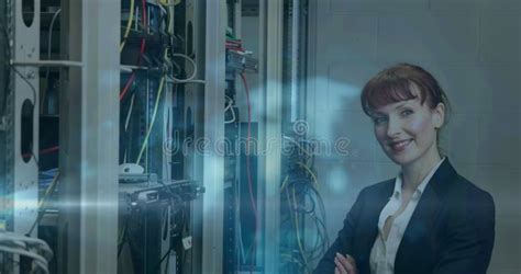 Image Of Light Trails Over Caucasian Female Worker In Server Room Stock