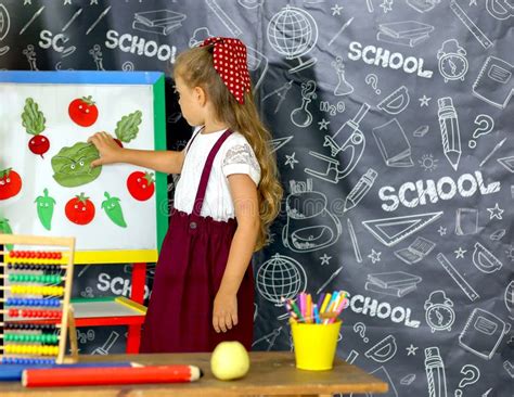 Cute Schoolgirl Girl In The Classroom Large Ruler Stock Image Image Of Caucasian Learn