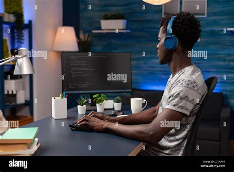 Programmer Businessman With Headset Typing Binary Code For Website