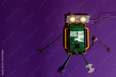 Hand Made Robot Flat Lay On The Arduino Platform DIY AI STEAM Purple Dark Background Stem