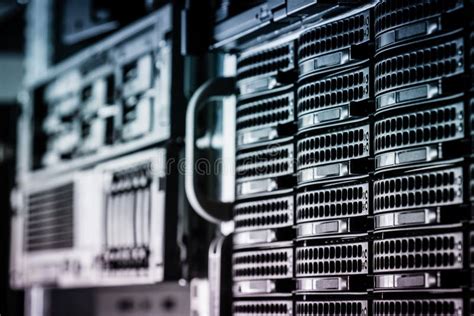 cluster of data storage ssd hard drives inside server rack stock image