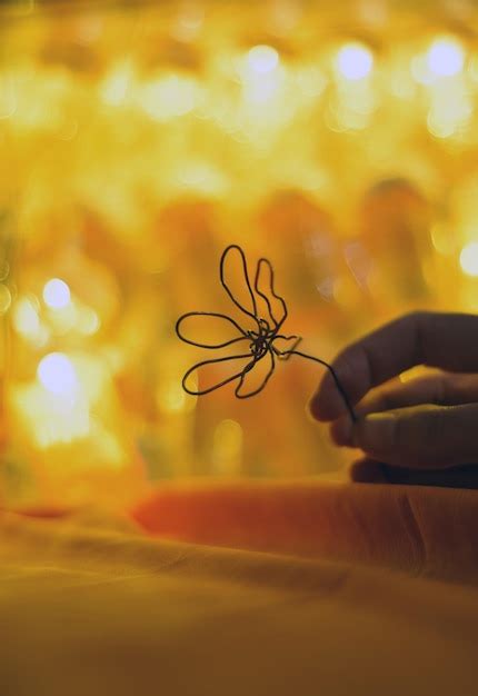 Premium Photo Cropped Hand Holding Tangled String