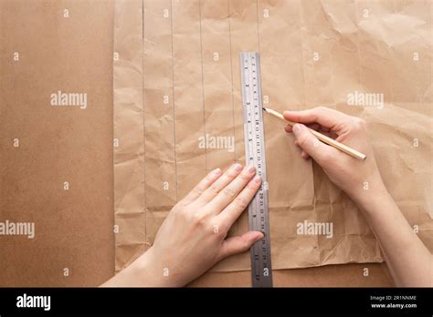 measure the package and divide it into strips making segments step by