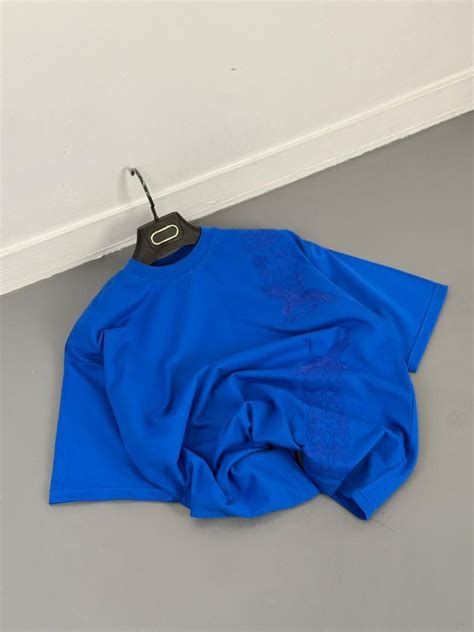 خرید تیشرت مردانه در انواع و طرح های مختلف با کیفیت عالی