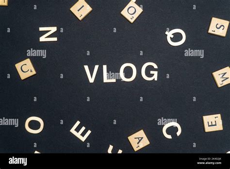 Vlog Word Written On Dark Paper Background Vlog Text On Dark For Your Designs Concept Stock