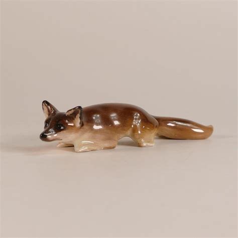 At Auction Royal Doulton Early Small Model Of A Slinking Fox In Natural Colours Hn147 L 13cm