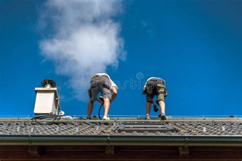 Men Worker Installing Solar Photovoltaic Panels On Roof Alternative Energy Saving Resources