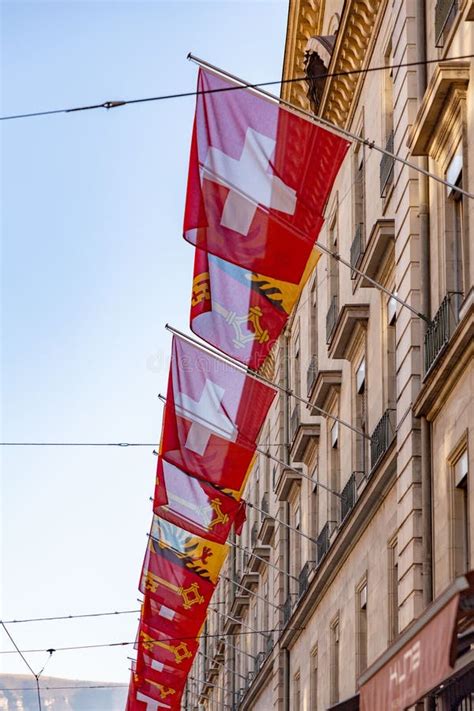 Swiss And Geneva Flags Around The Rue De La Corraterie In Geneva Switzerland Editorial