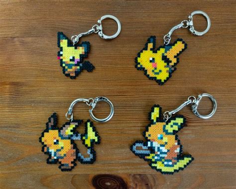 Pichu Pikachu Raichu And Alolan Raichu Pokemon Keychains Etsy