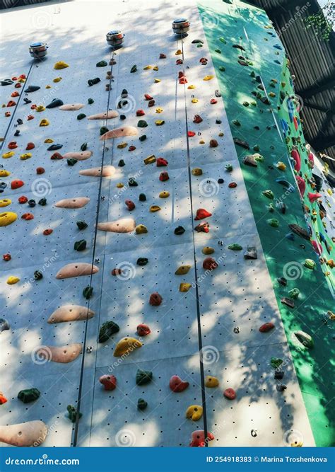 Artificial Rock Climbing Bouldering Wall Showing Various Colored Grips