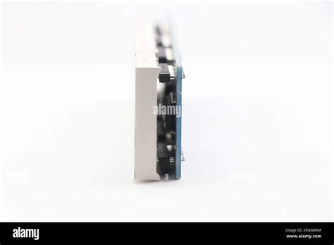 Side View Of An LED Matrix Display Board With The Series Of Connections Pins On A Printed