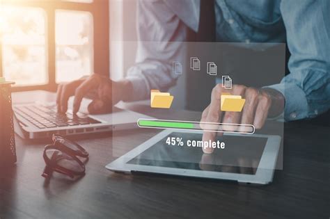 Premium Photo Transfer Files Data System Relocation Concept Person Hand Using Digital Tablet