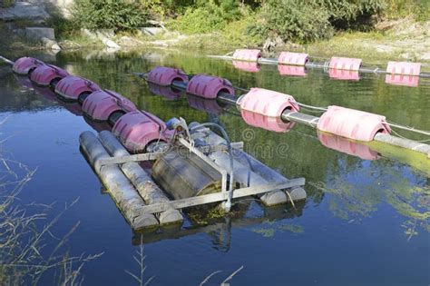 Floats With Pipes And Pumps For Water Intake From The River Stock Image