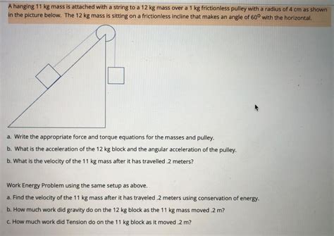 Solved A Hanging Kg Mass Is Attached With A String To A Chegg