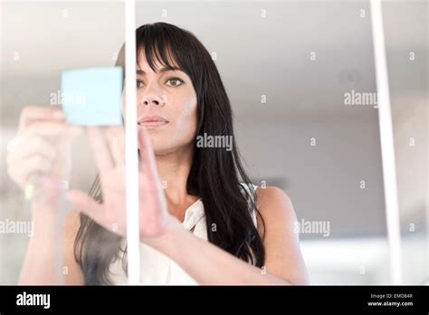 Woman Planning A Project With Sticky Notes Stock Photo Alamy