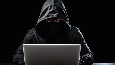 Premium Photo Cybersecurity Concept Hooded Man With Laptop In Darkness