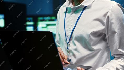 Free Photo Engineer In Data Center Fixing Issues