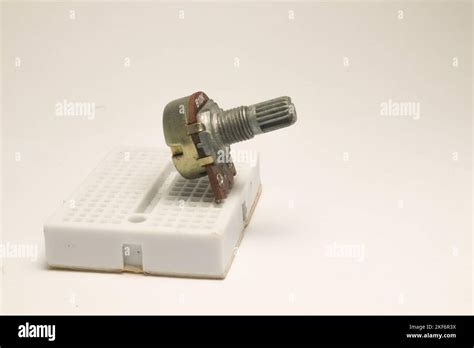 a variable resistor or potentiometer with code b10k stuck on a small