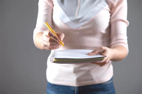Premium Photo Woman Hand Pen And Notepad
