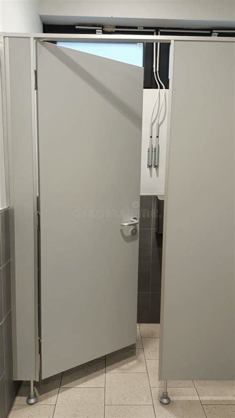 The Contemporary Public Restroom Stall Featuring A Door For Enhanced