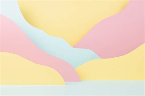 추상 파스텔 화려한 무대 모형과 산 핑크 노랑 민트 색상의 종이 풍경과 귀여운 부드러운 패션 스타일 광고 디자인 프리젠 테이션 화장품 생산 카드를위한 템플릿 3차원 형태에