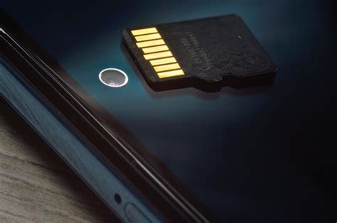 Premium Photo Micro Sd Card Lies On The Smartphone Screen Closeup