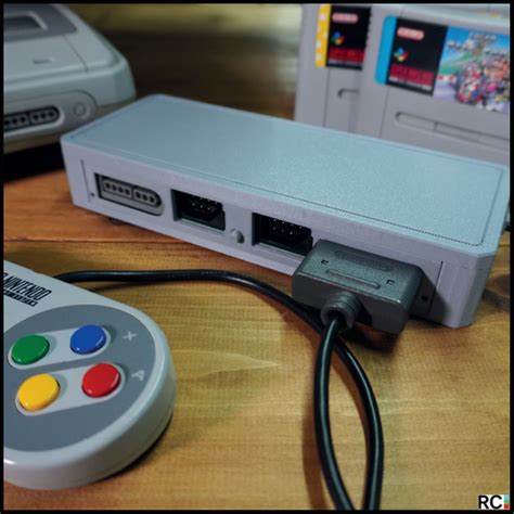 Super Ctrldock Nes And Snes Interface In Grey Enclosure