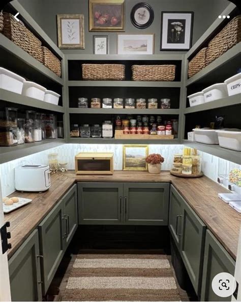 Moody Green Pantry Makeover With Stained Countertops And Marble Backsplash