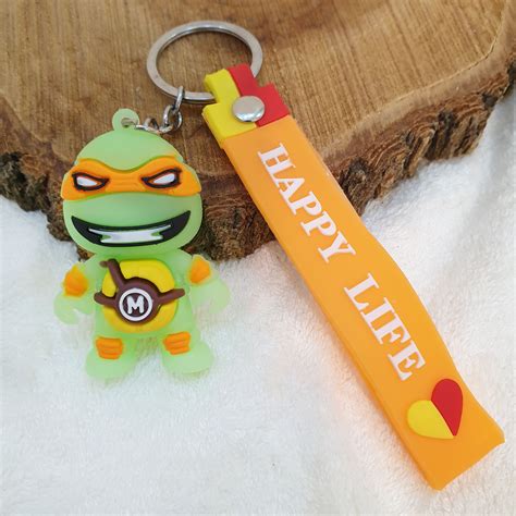 قیمت و خرید جاکلیدی مدل سیلیکونی طرح لاک پشت نینجا کد Db20 مجموعه 4 عددی